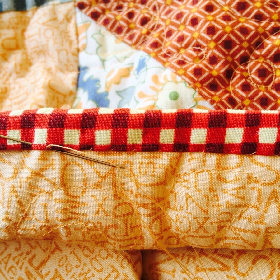 Hand Sewing the Binding on a Quilt Tutorial | susies-scraps.com