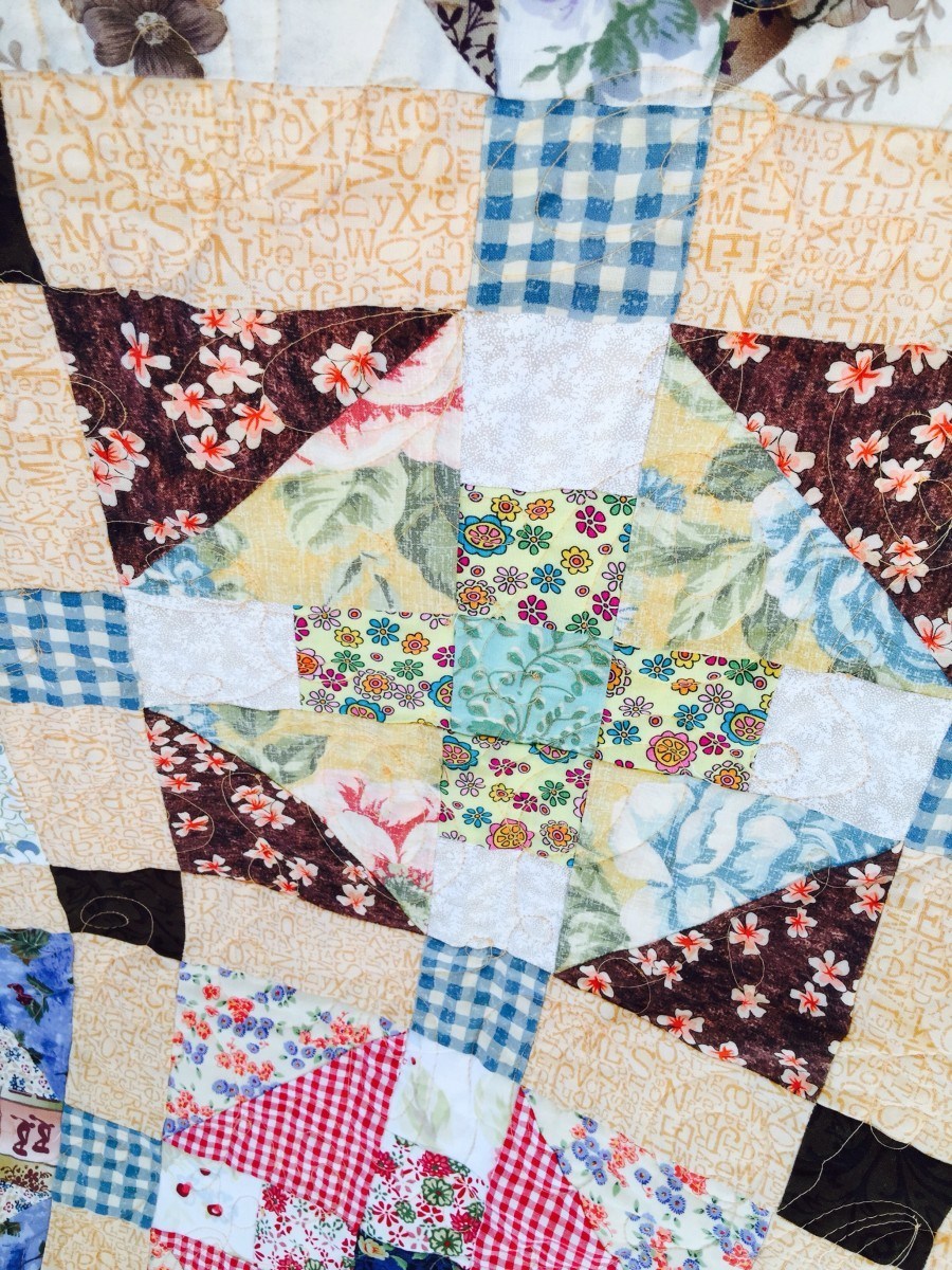 Monkey Wrench Charm Square Quilt | susies-scraps.com