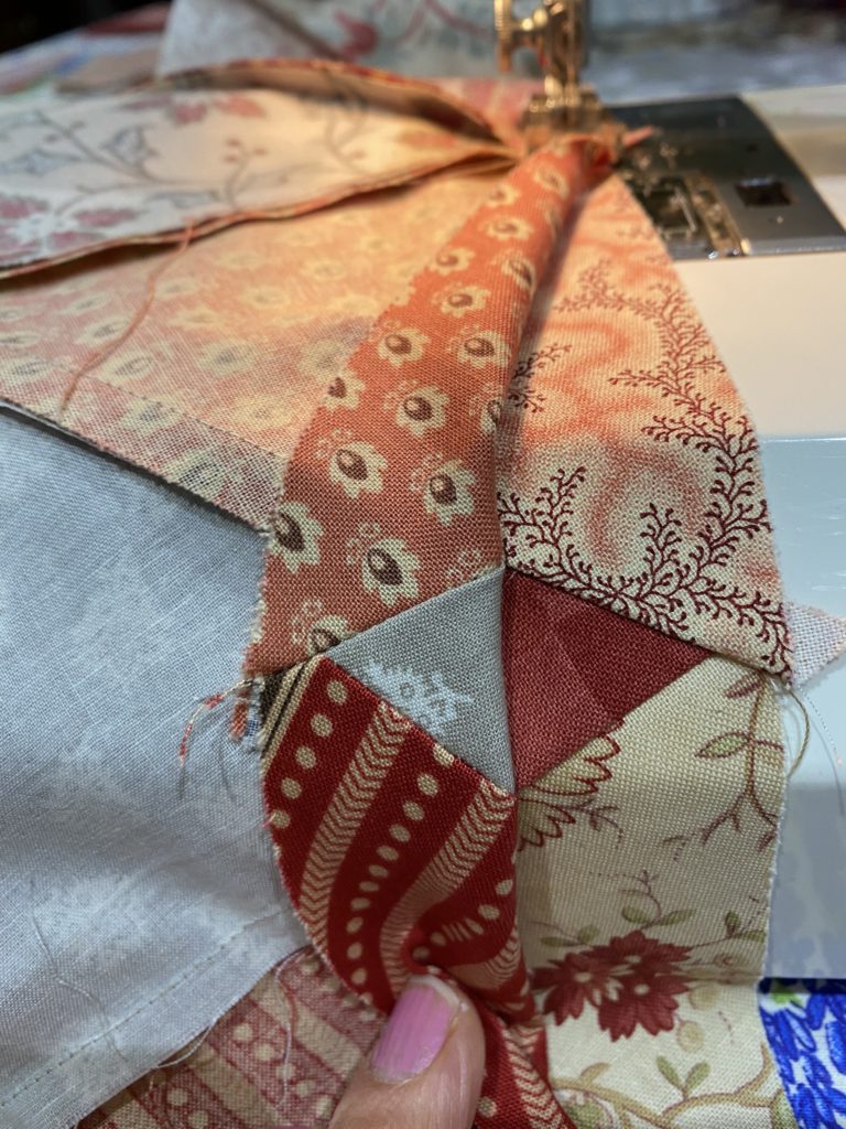 Scrappy Thousand Pyramids Quilt and Lessons in Pyramids | susies-scraps.com